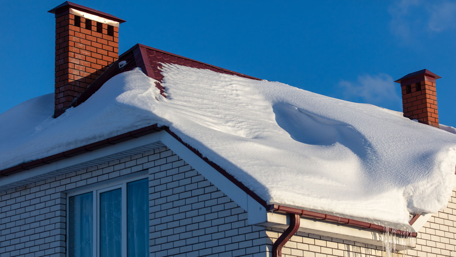 How to Safely Remove Snow from Your Roof – eRoofs Blog